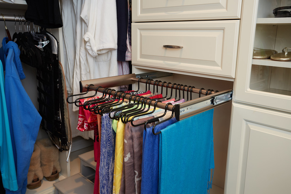 Traditional highly-functional custom women's walk-in closet ...