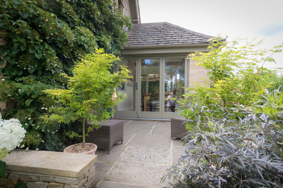 Modern Garden Room with amazing picture window and multifold doorset ...