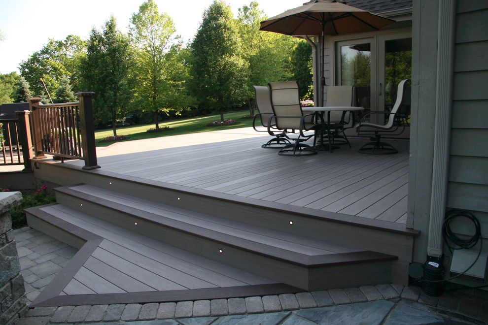 Azek deck with lighting, flower boxes, and benches - Traditional - Deck ...