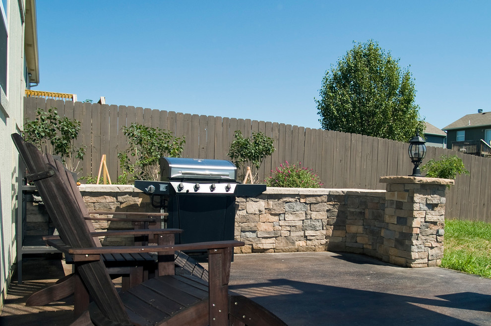 Brinkman - Cedar deck in KC with stamped concrete patio and fire pit ...