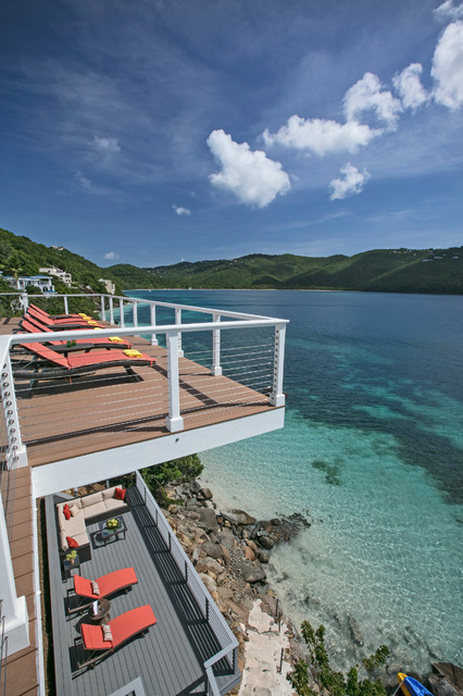 Cantilevered deck with a wire railing overlooking Magens Bay on St ...