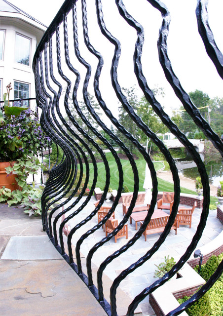 Curved Exterior Staircase With Wrought Iron Balcony Rail Traditional