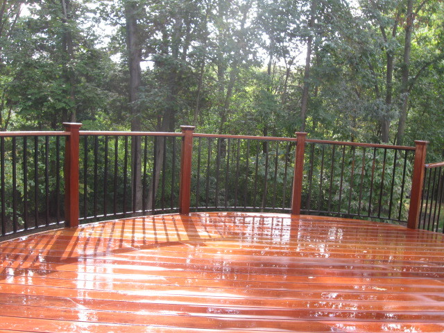 Elevated curved Ipe deck in Herndon, VA, with spiral staircase ...