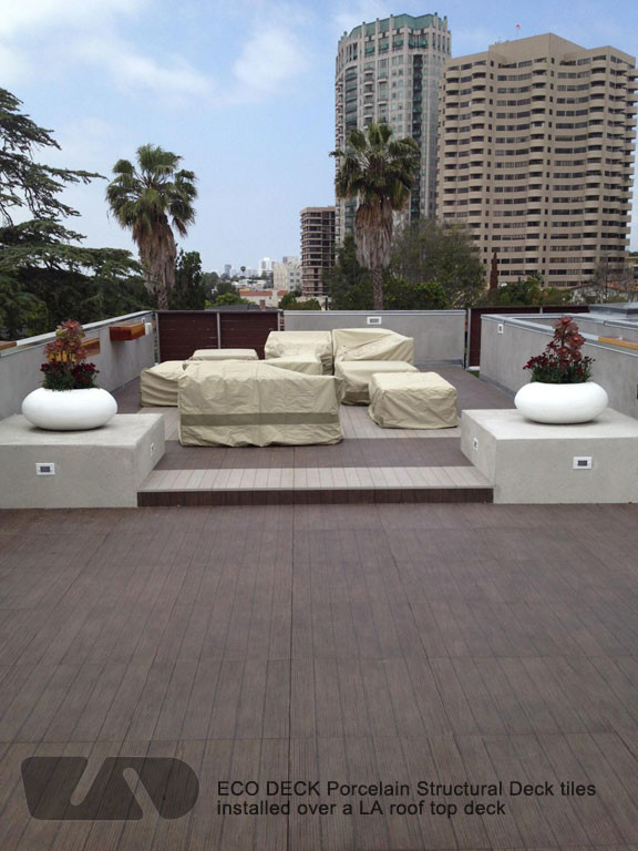 Los Angeles rooftop with lightweight porcelain deck tiles on pedestals ...