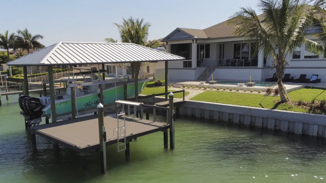 Luxury Dock, Boat House & Lift - Beach Style - Deck - Tampa - by ...