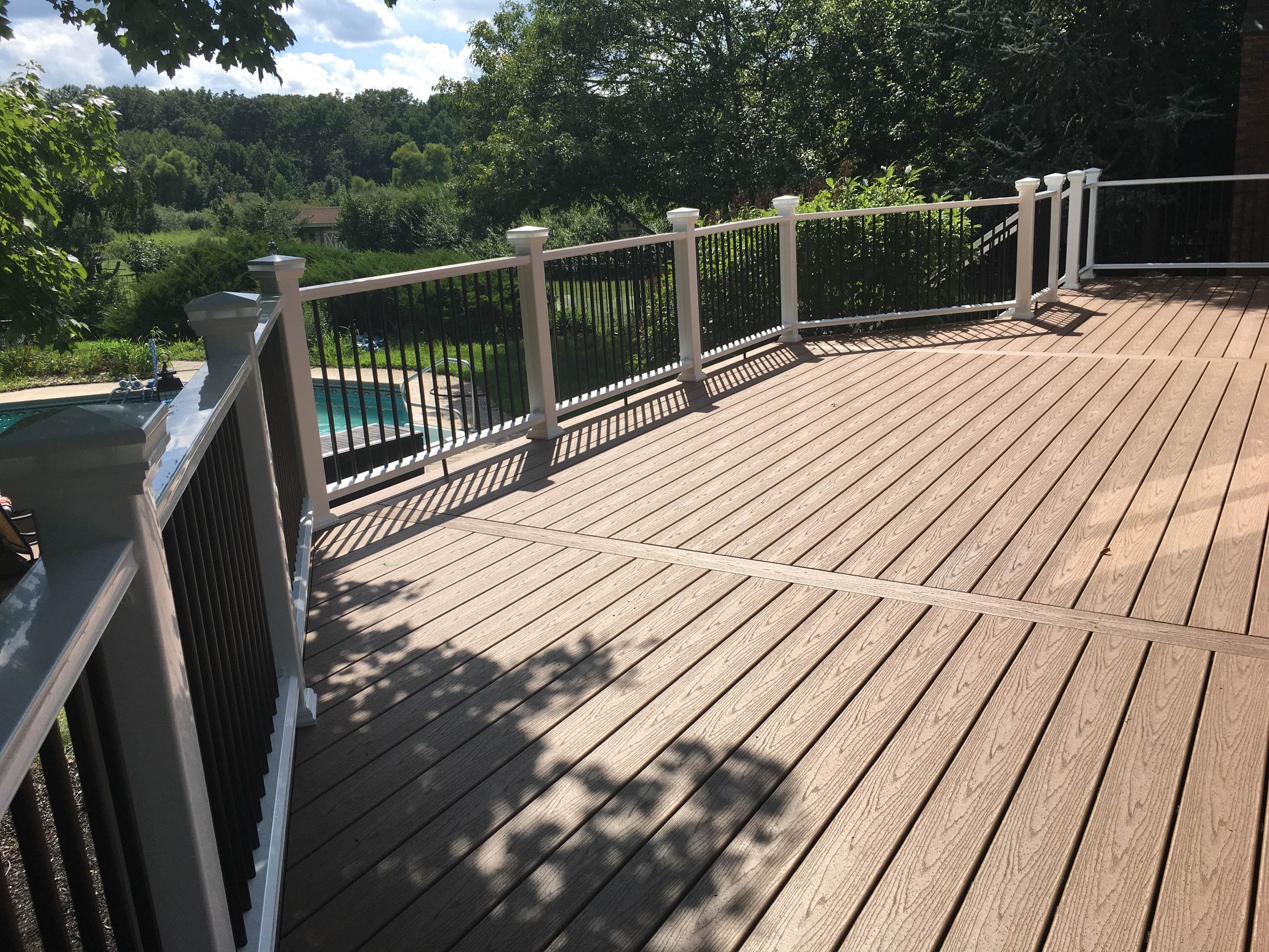 Trex Decking With A Hot Tub Inset And Trex Benches
