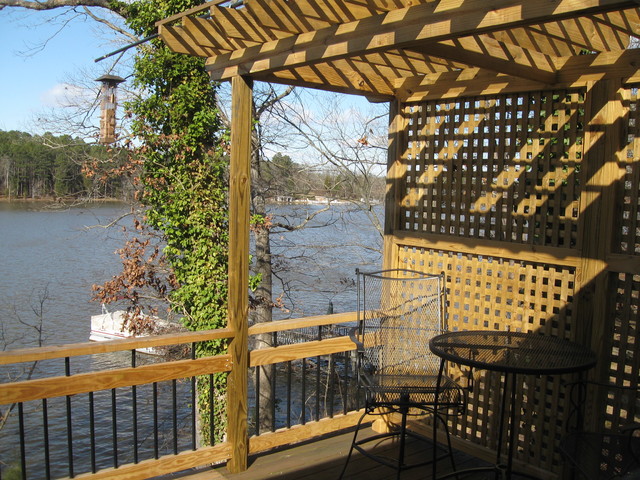 new deck on back overlooking lake - Rustic - Terrace - Raleigh - by DK ...