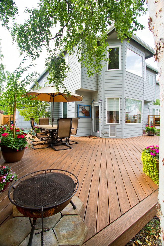 Outdoor Living Spaces Created from Angled Front Deck and Back Decks ...