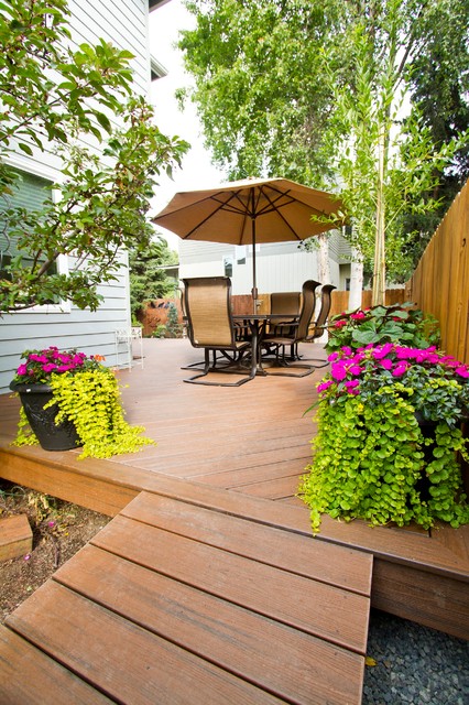 Outdoor Living Spaces Created from Angled Front Deck and Back Decks ...