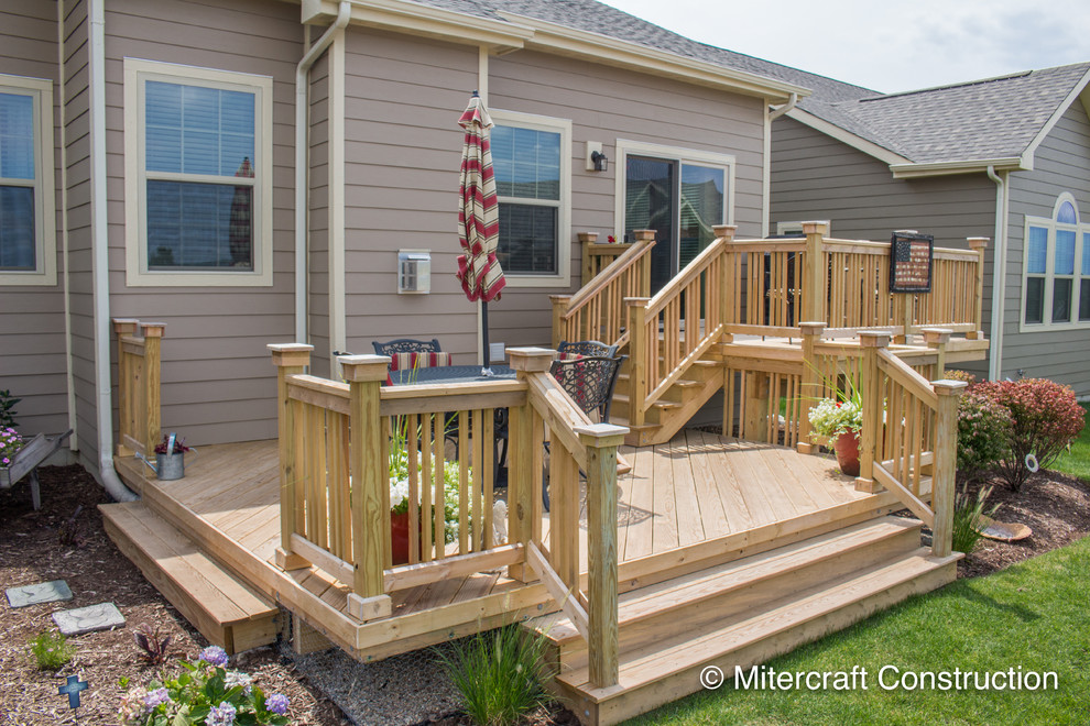 Pressure Treated Bi-Level Deck with Custom Rail - Deck - Chicago - by ...