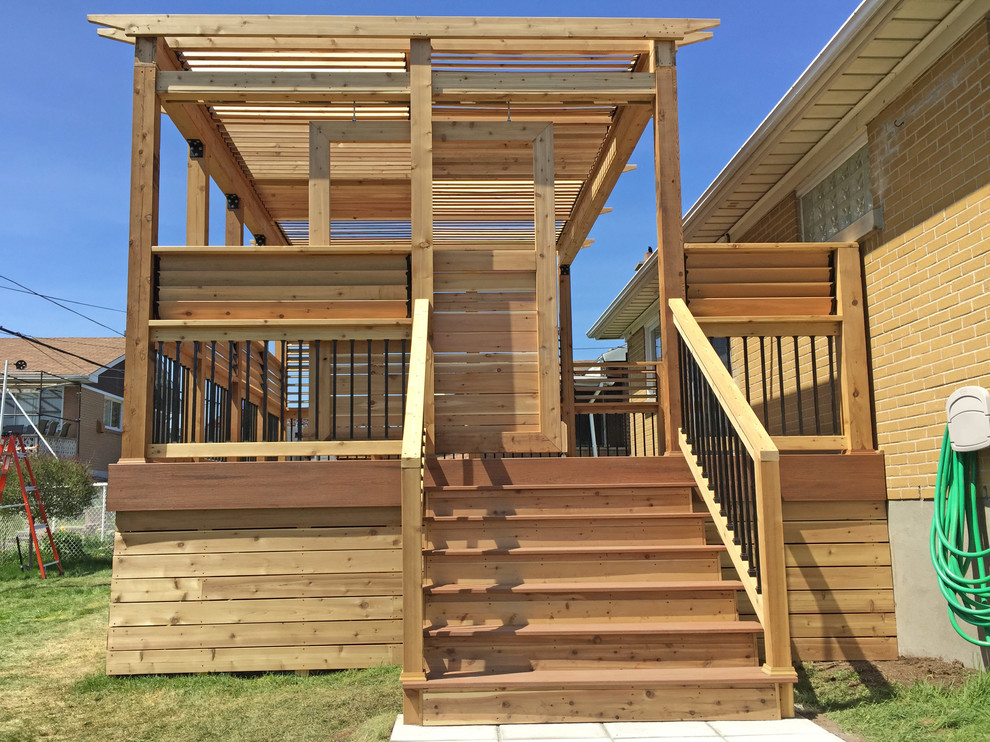 Trex Transcend Tiki Torch Deck With Western Red Cedar Pergola & Privacy ...