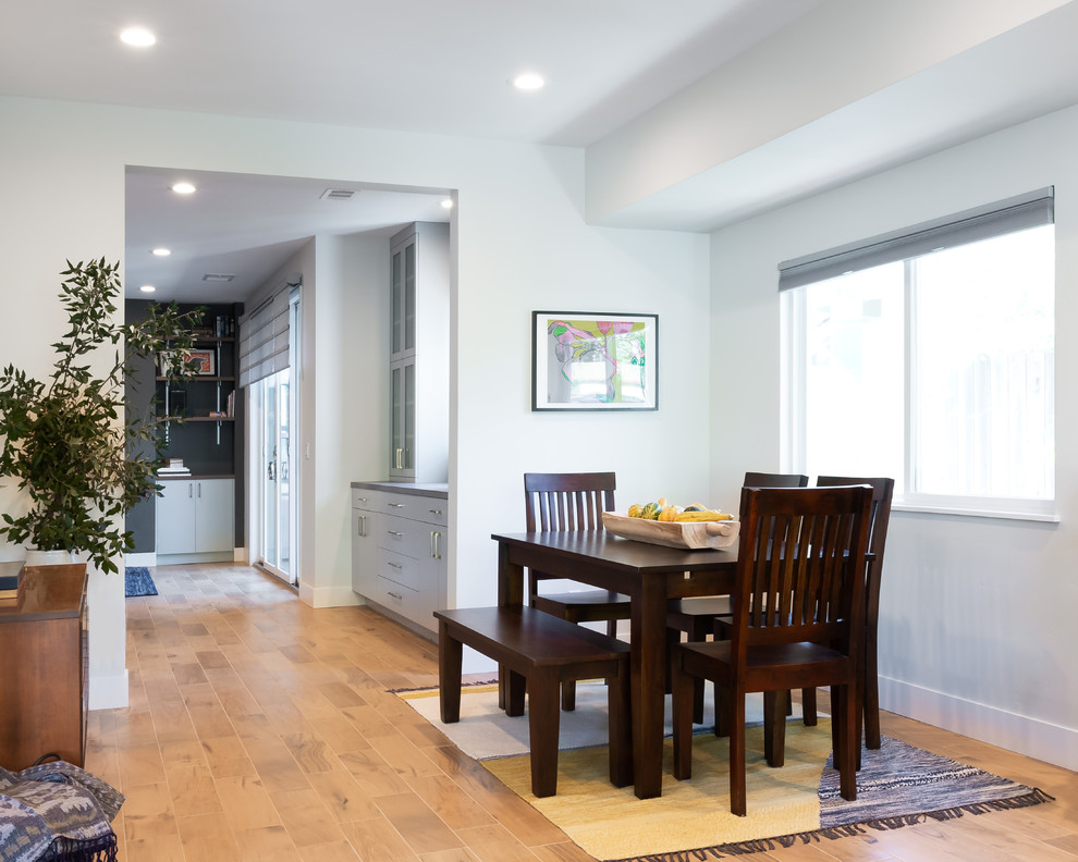 Dining Room with Opening to Kitchen and Sliding Glass Doors to Backyard ...