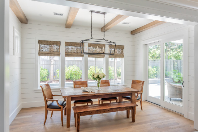 Open Dining Room with Exposed Beams and Views of the Pool - Beach Style ...