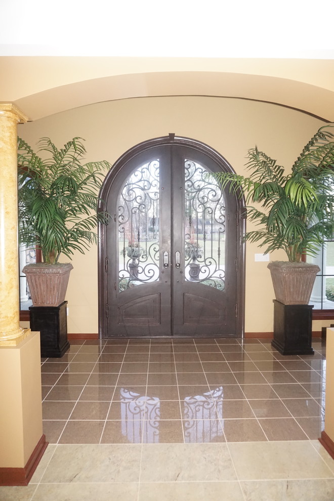 A Tuscan style home in Pennsylvania - Tropical - Entry - Philadelphia ...