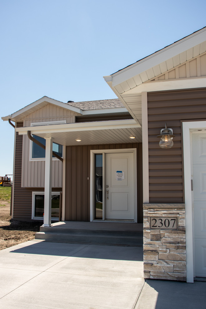 Bi-level Custom Home with Taupe and Cream Color Palette - Traditional ...