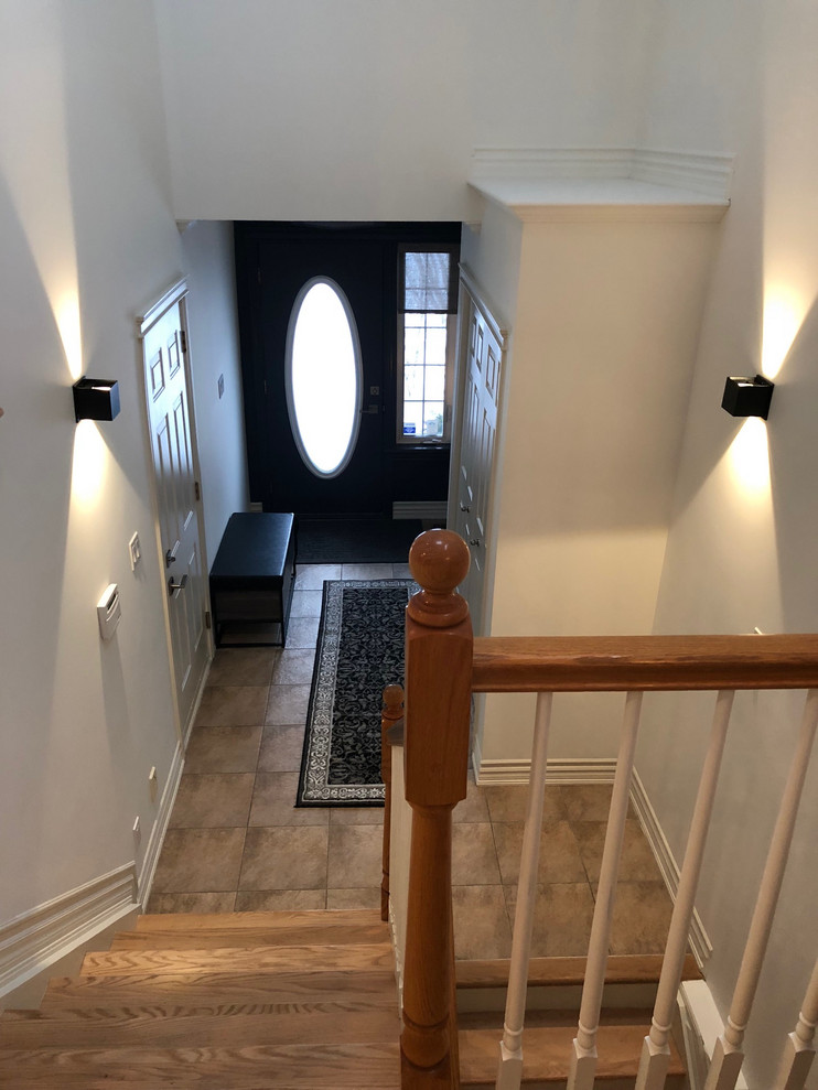 Dramatic Suburban Townhome transformation - Transitional - Entry ...