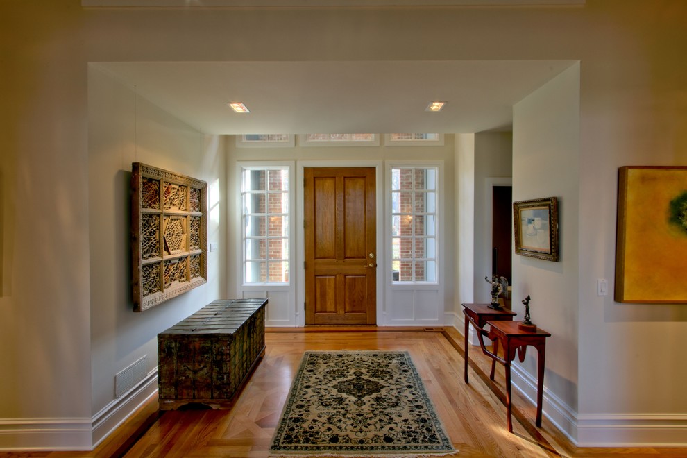 Entryway with Gallery Lighting to Highlight Artwork and Transom Entry ...