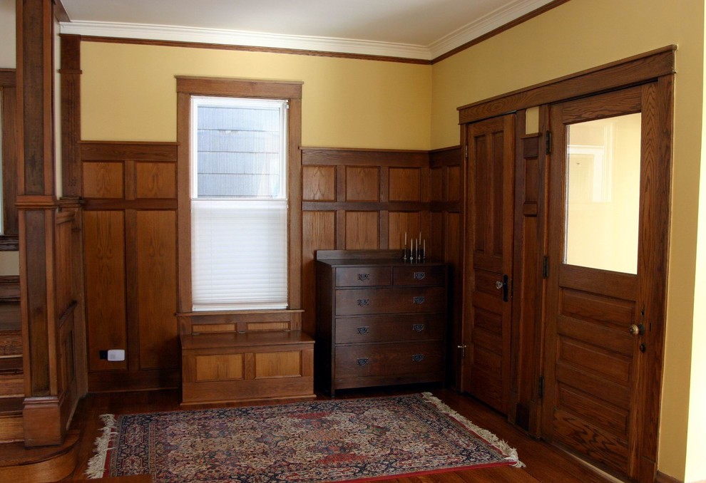 New paneling creates a sense of an entryhall without building walls ...