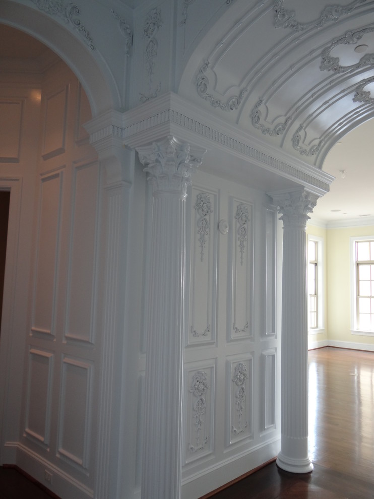 Ornate paneling including foyer barrell plus fluted columns ...