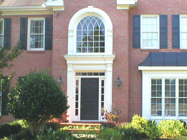 Six-panel entrance door with sidelites and transom and foyer palladian ...