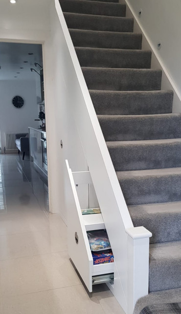 Unde rstairs storage with pull outs - Modern - Staircase - London - by ...