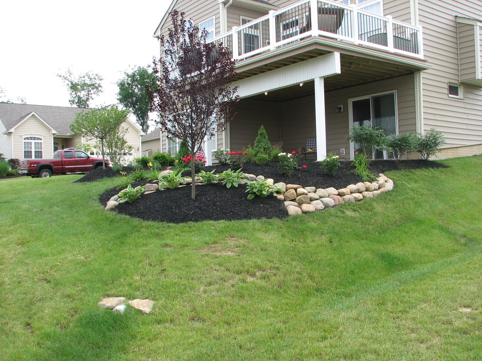 AZEK Arial Deck With Colored Stamped Patio Below - Traditional ...