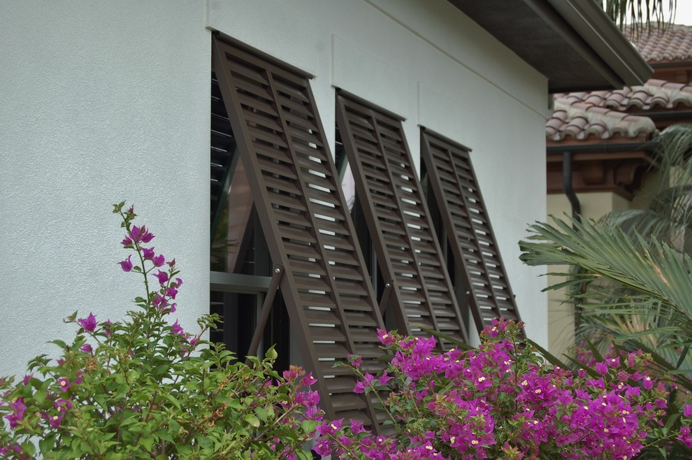 Bahama & Louvers - Tropical - Exterior - Tampa - by Jansen Shutters ...