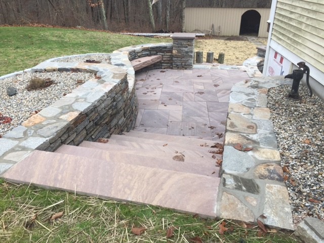 Brownstone steps with brownstone pattern patio - Traditional - Exterior ...