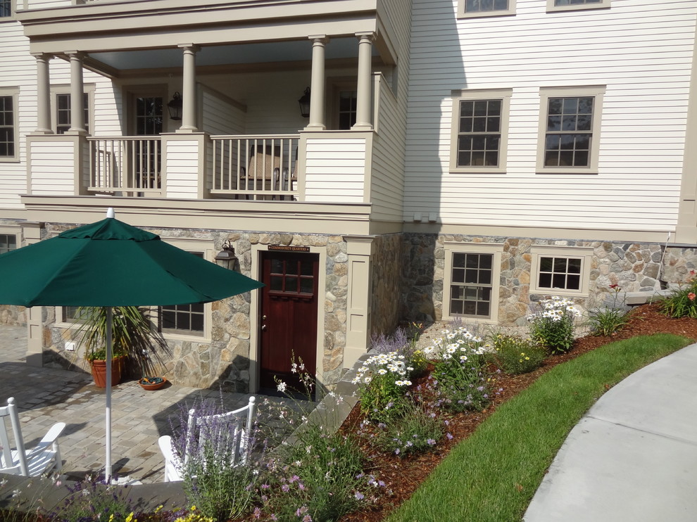 Cape Cod Inn with New England Stone Cladding, Retaining Walls, and ...
