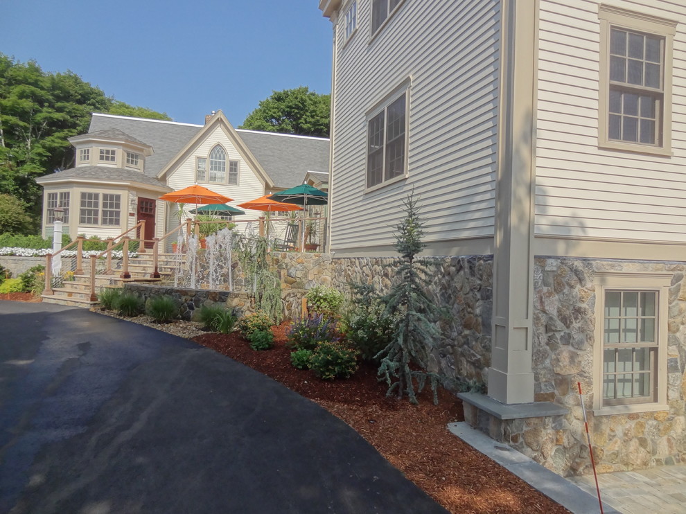 Cape Cod Inn with New England Stone Cladding, Retaining Walls, and ...