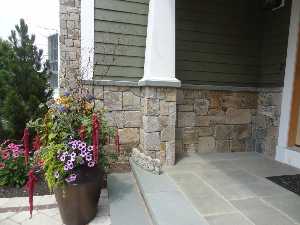 Combining Colonial Tan Natural Stone with Olive Green Siding ...
