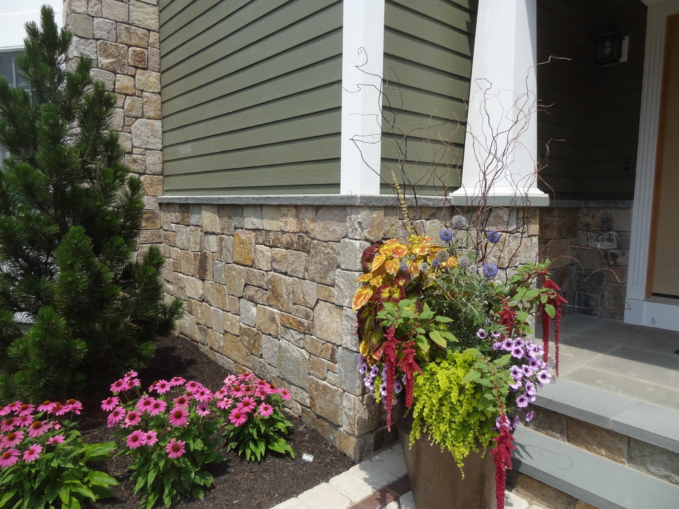 Combining Colonial Tan Natural Stone with Olive Green Siding ...