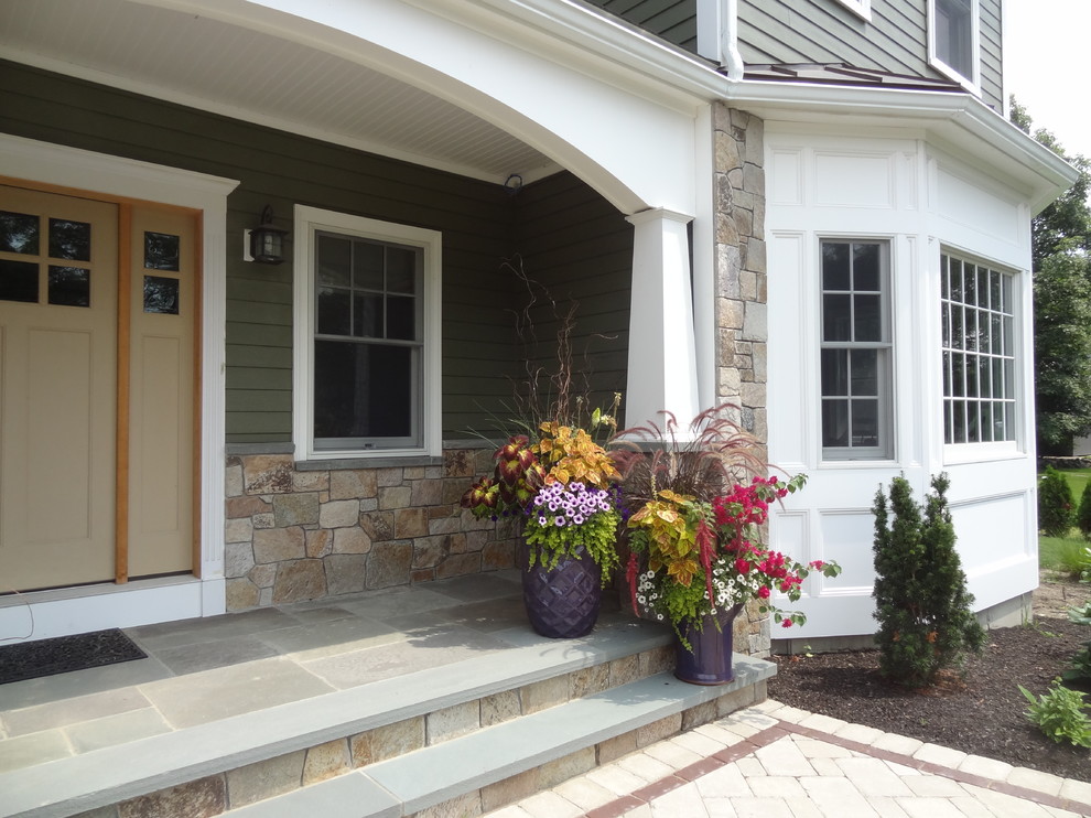 Combining Colonial Tan Natural Stone with Olive Green Siding ...