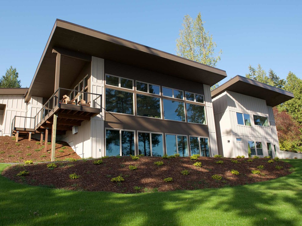 Contemporary Waterfront on Sloped Lot - Beach Style - Exterior ...