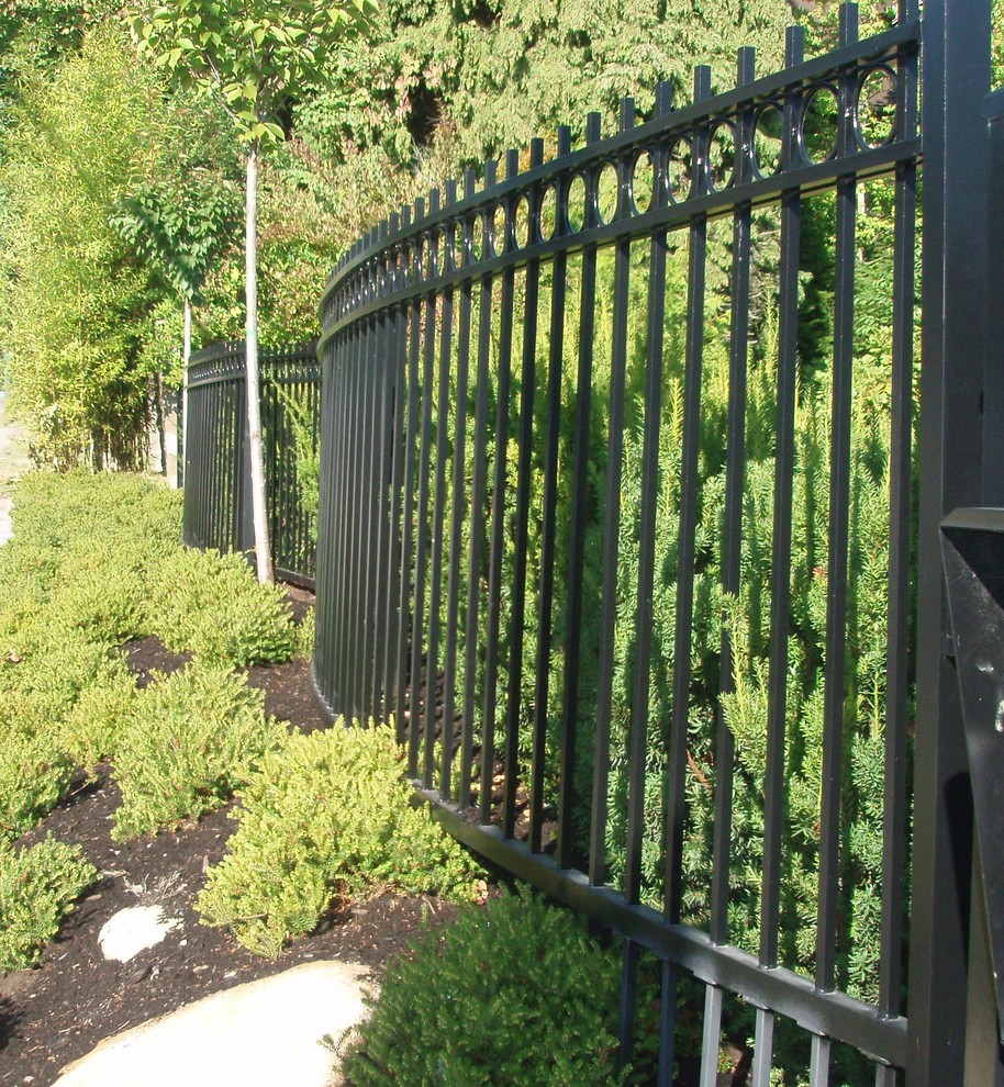 Curved Metal Fence - Exterior - Vancouver - by Contour Landscape ...