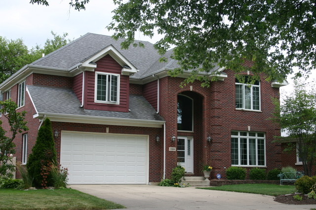 Custom Red Brick Home with Attached Garage - Traditional - House ...