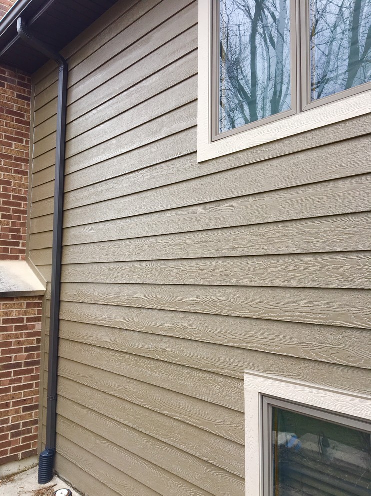 Diamond Kote siding, aluminum Dark bronze soffit and gutters - Exterior ...