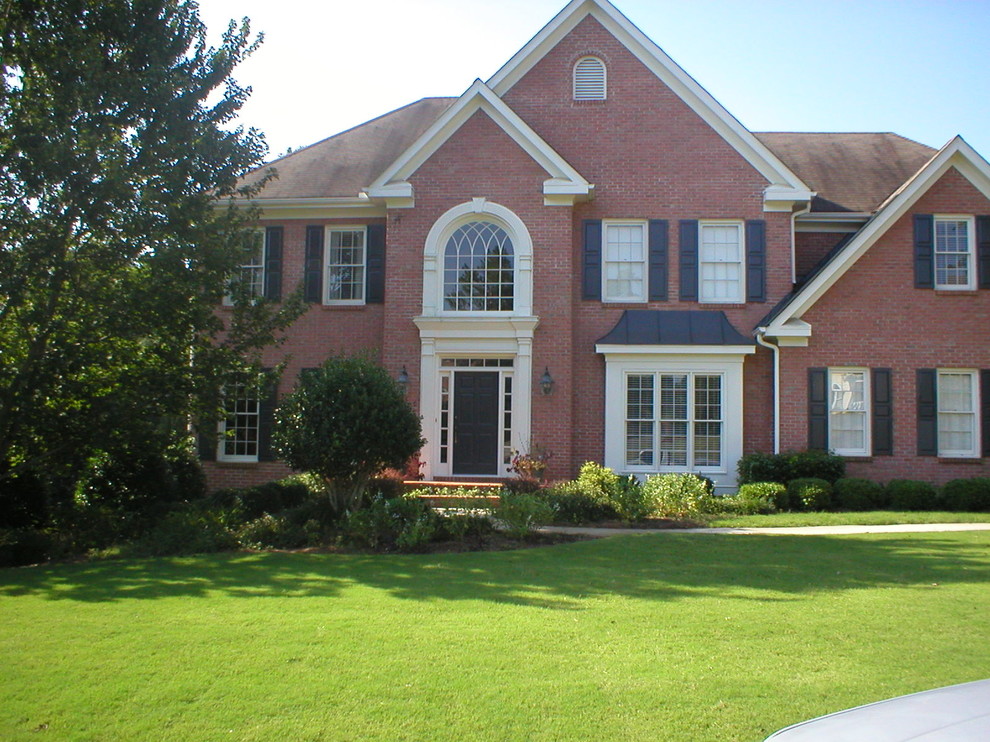 Double-hung windows and foyer palladium window with gothic grills ...