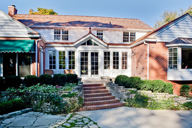Elegant brickwork defines back entrance of traditional home ...