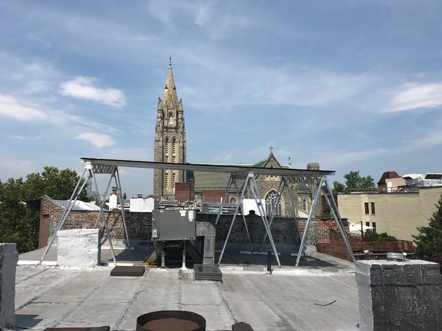 Elevating solar above rooftop AC units with the Brooklyn Solar Canopy ...