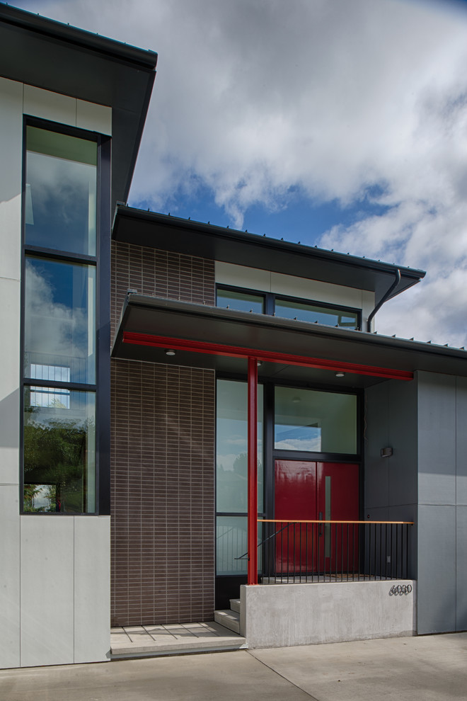 Entry with exposed structure and metal roof - Modern - House Exterior ...