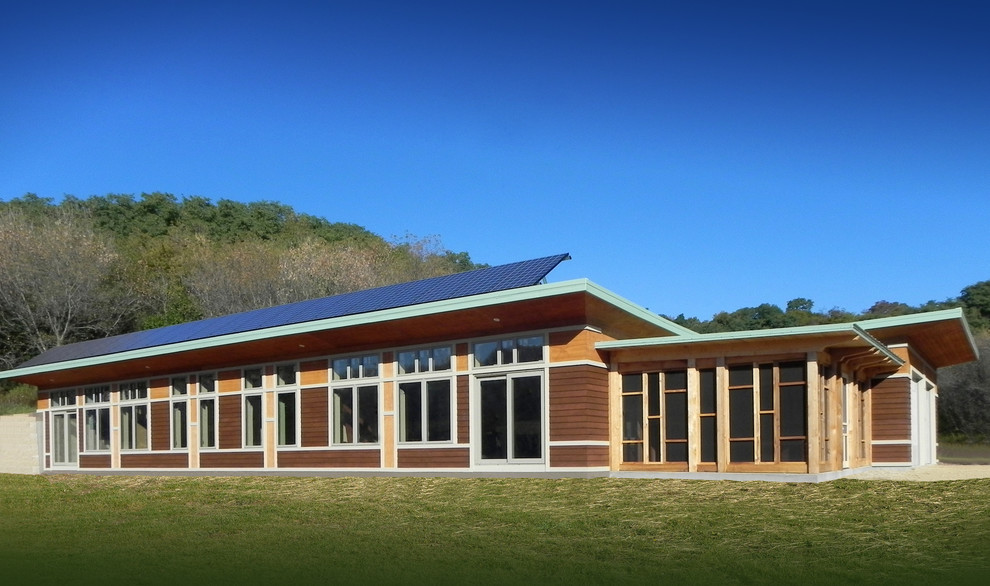 Exterior view showing south-facing window wall, screen porch and ...
