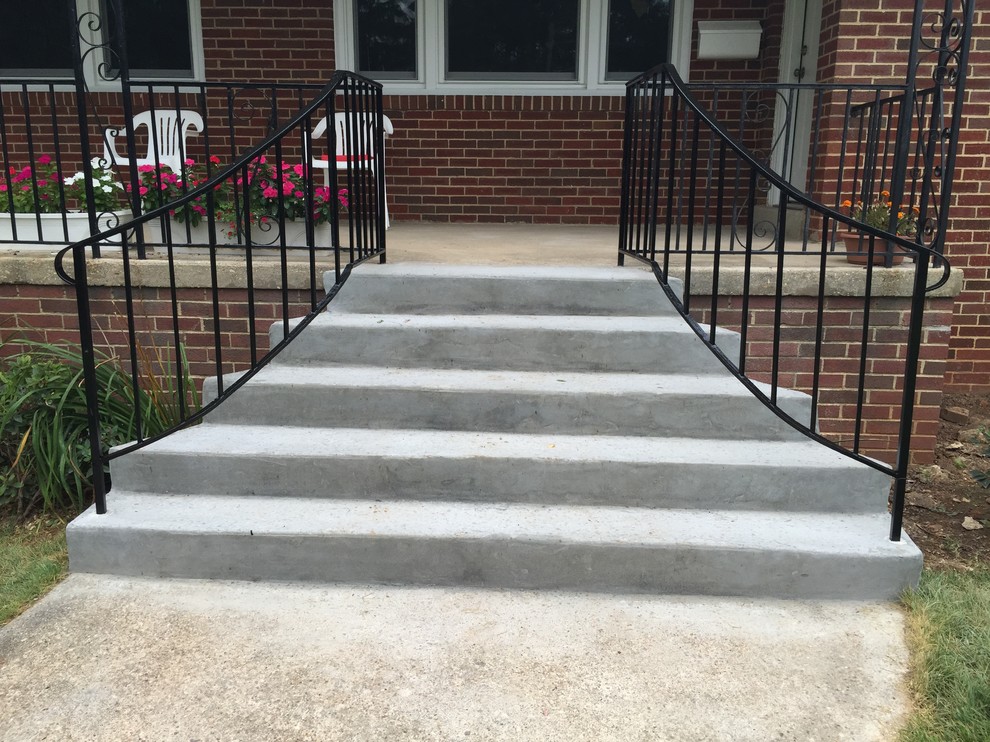 Fanned Out Concrete Stairs in Silver Spring MD With Curved Iron Railing ...