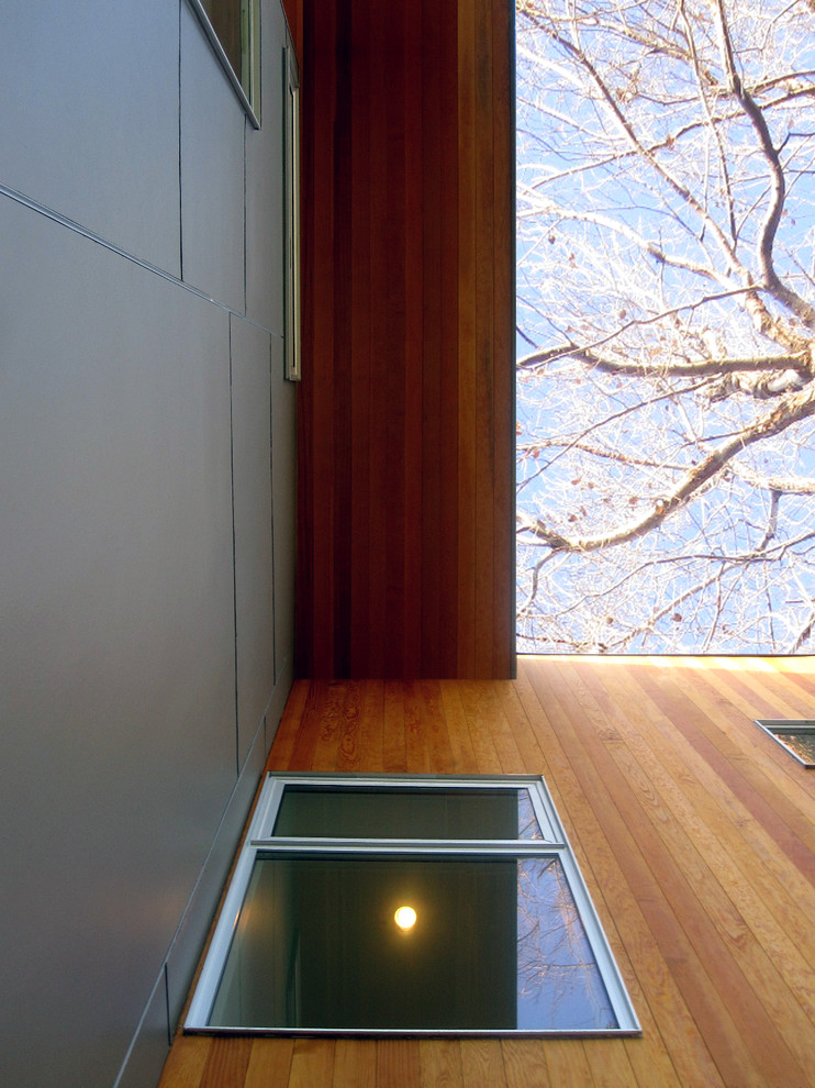 Franklin Street Residence: Panel siding meeting clear cedar siding ...