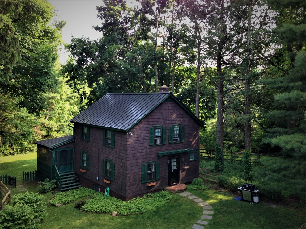Matte Black Standing Seam Metal Roof on Cottage-Style Home - Rustic ...