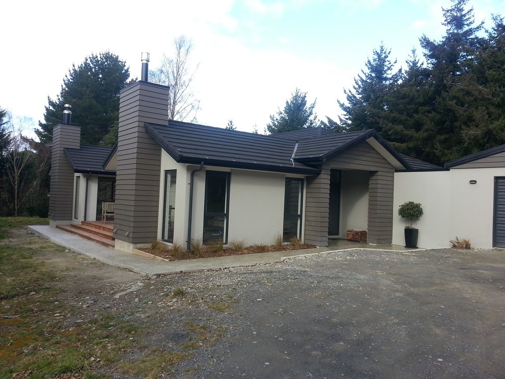 Modern Home built in place of tired house, what a transformation ...