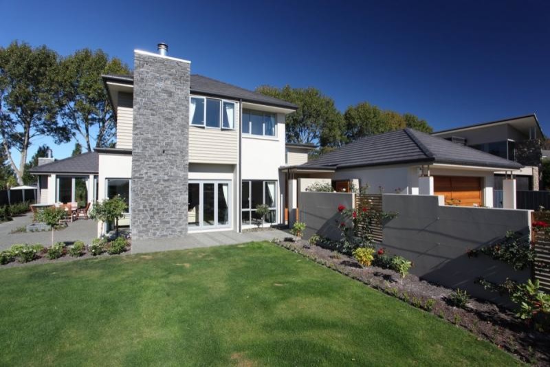 Modern house with stone chimney - Contemporary - Exterior ...