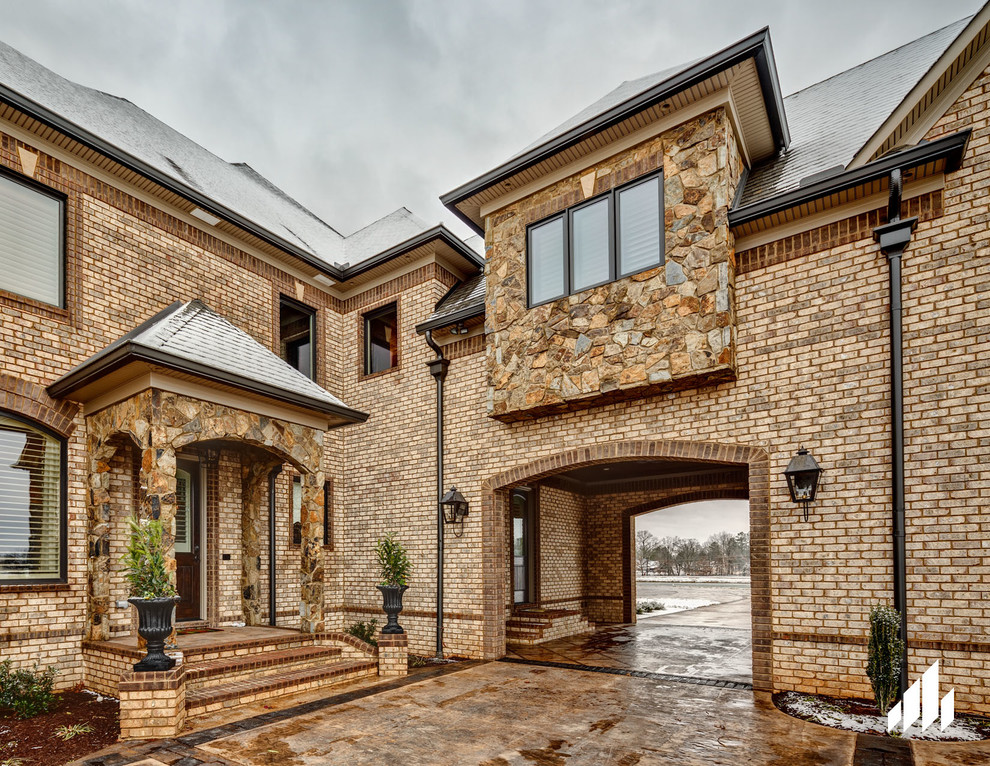 Nottingham Tudor Brick Home featuring Millstone Accents - Tennessee ...