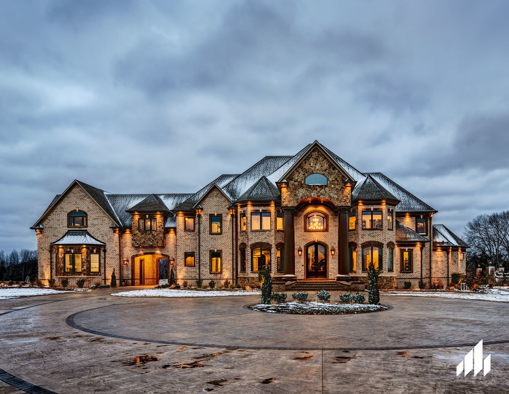 Nottingham Tudor Brick Home featuring Millstone Accents - Tennessee ...