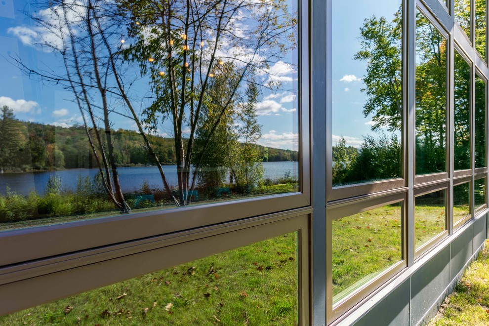 Our signature wall of windows reflects the exterior scenery. - Beach ...